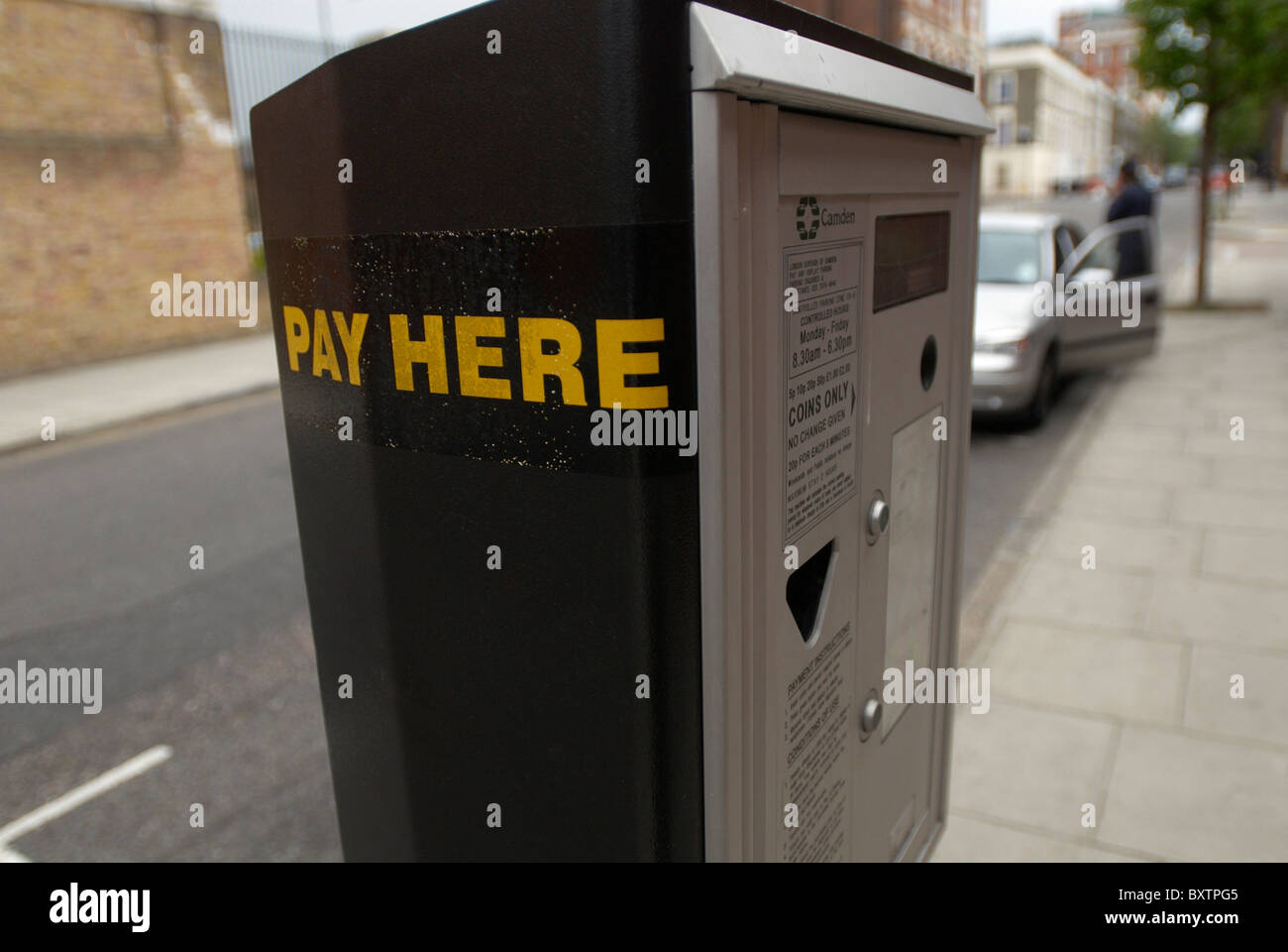 Pay Here machine Stock Photo - Alamy