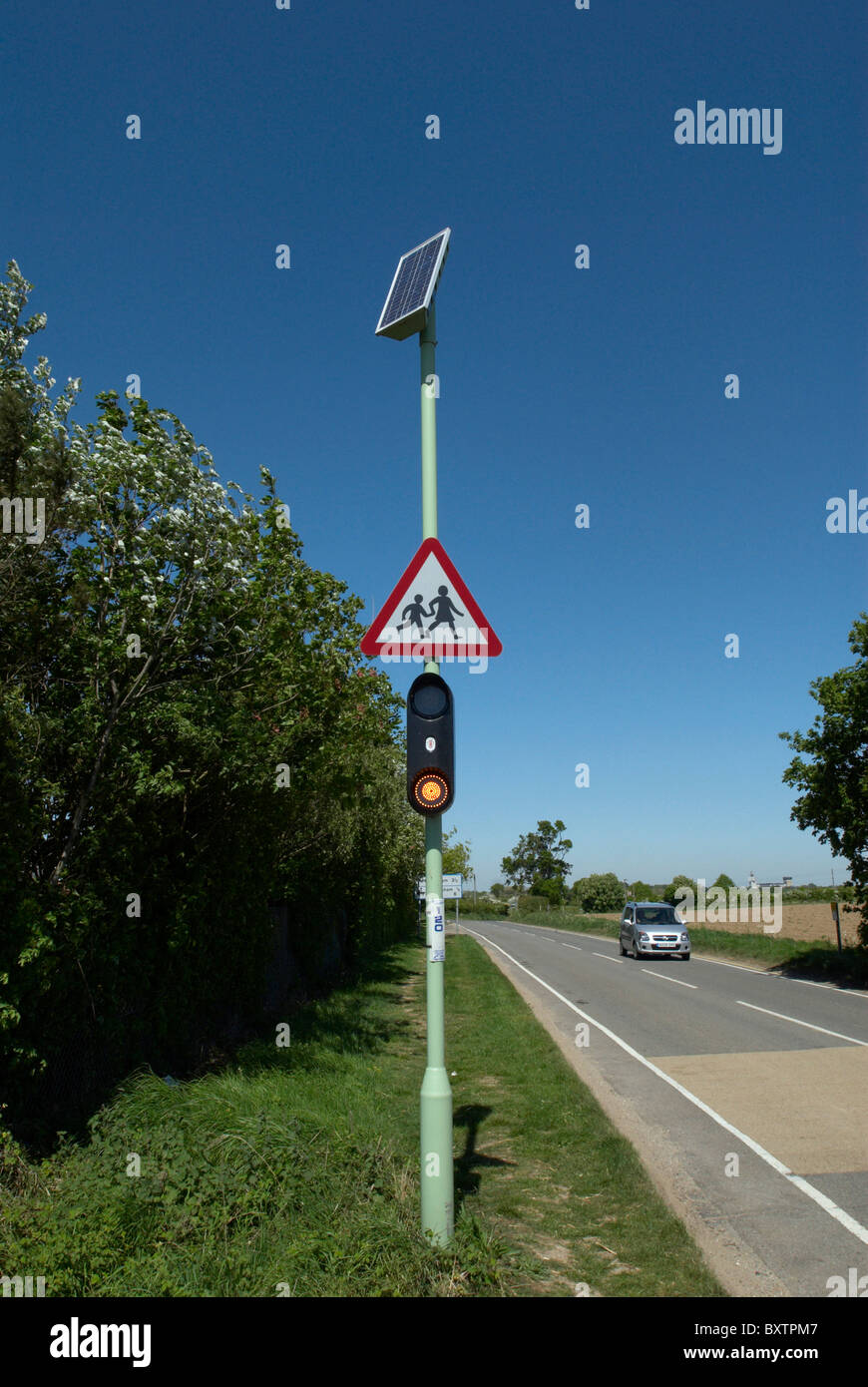 School crossing warning sign Suffolk UK Stock Photo - Alamy