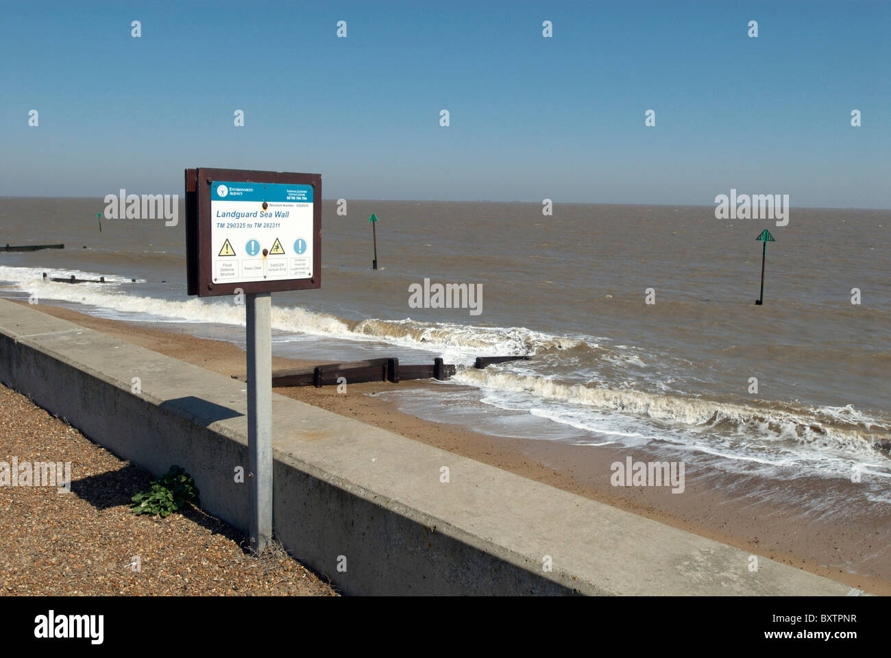 Sea wall warning sign Felixstowe Suffolk UK Stock Photo - Alamy