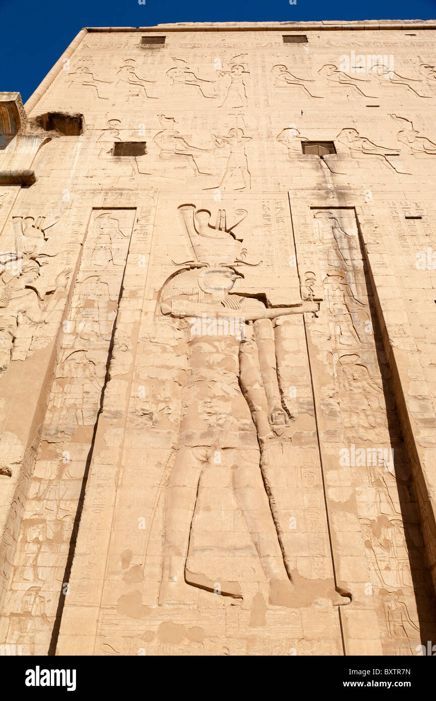 Edfu Temple, Egypt - giant carving on front facade 2 Stock Photo - Alamy