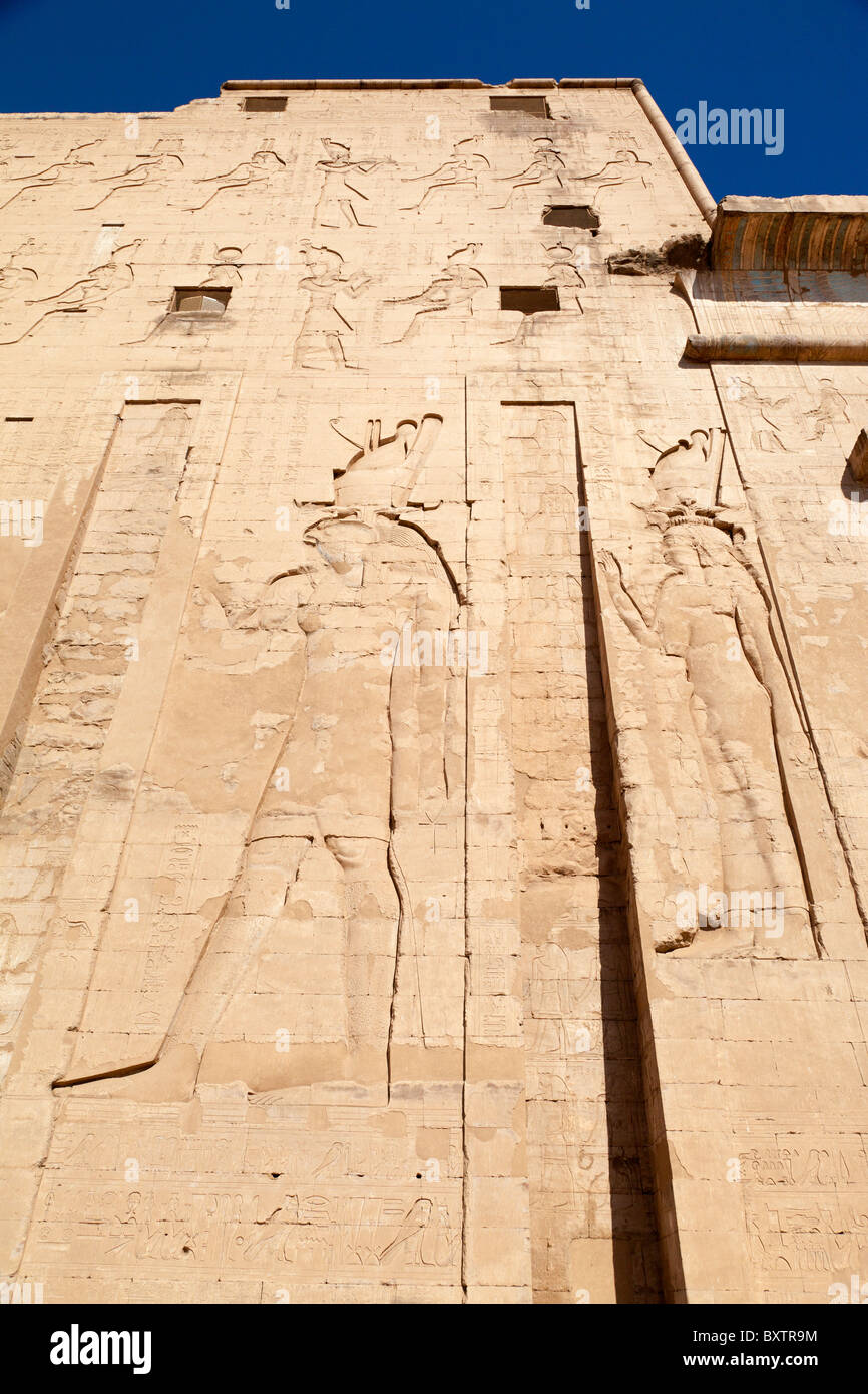 Edfu Temple, Egypt - giant carving on front facade 3 Stock Photo - Alamy
