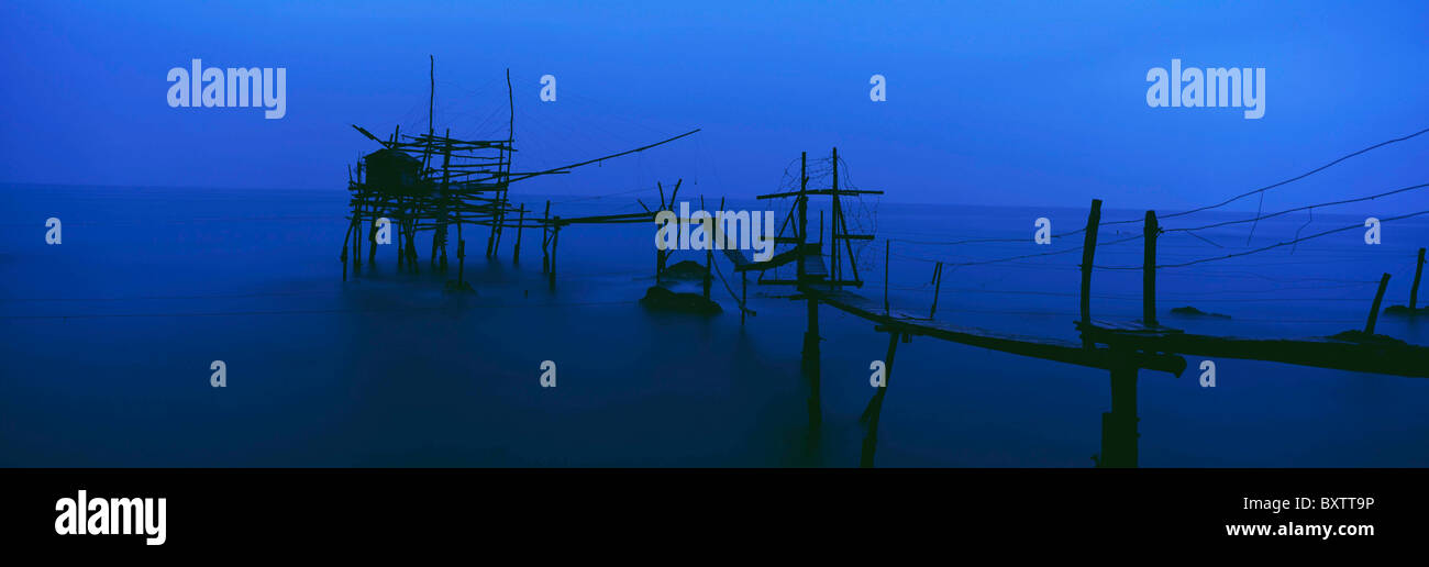 Old Fishing Platform Over Water At Dusk Stock Photo - Alamy