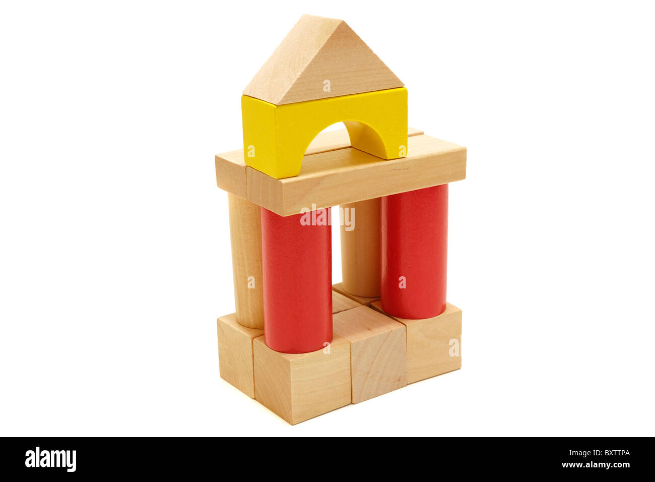 Set of colorful building blocks stacked to form houses. Could signify ...