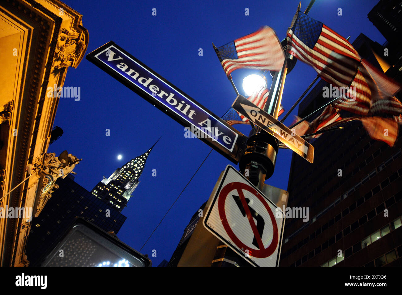 Chrysler building in twilight framed with street sign for Vanderbilt ...