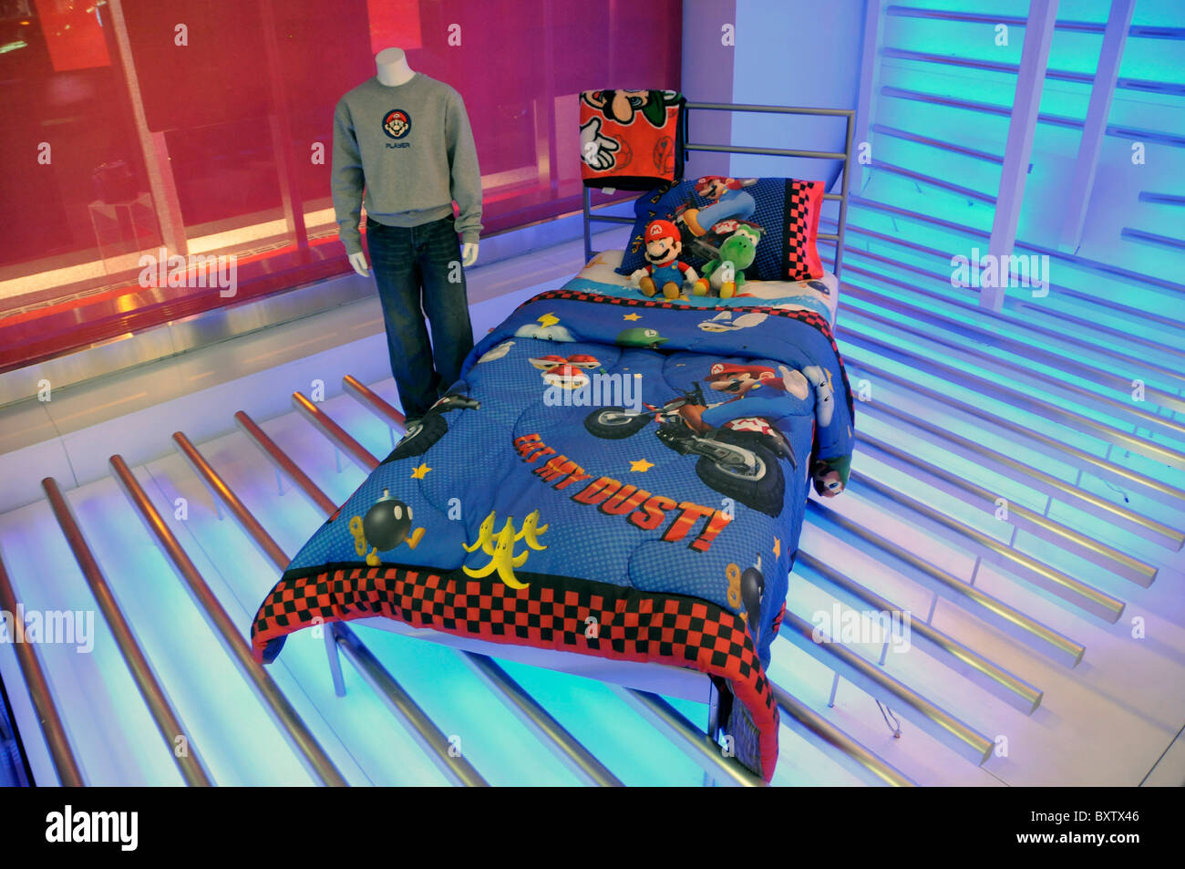 A bed decorated with items inspired from the Nintendo video games, on ...