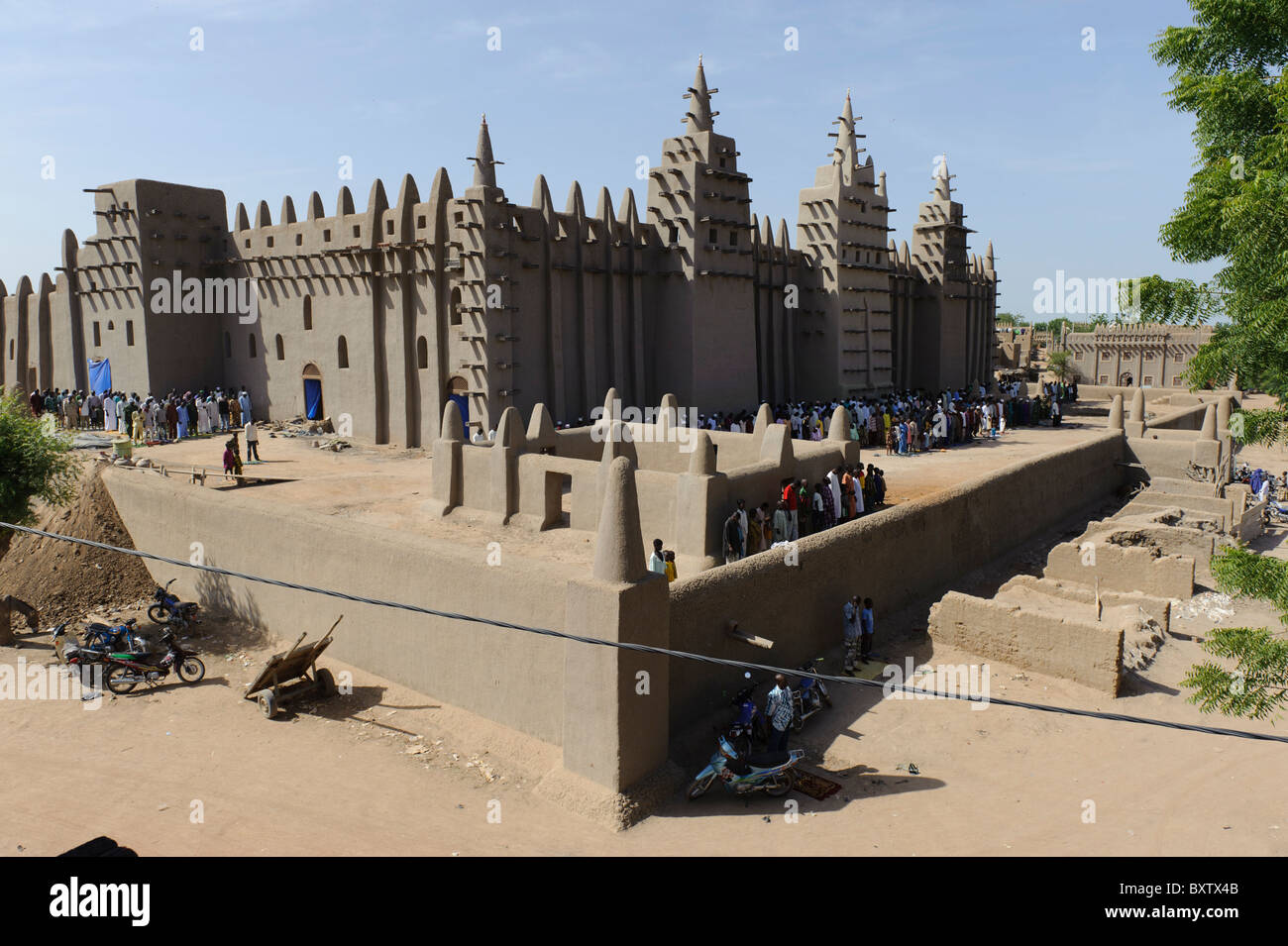 Muslim men gathering for prayer on the terrace of the Great Mosque on ...