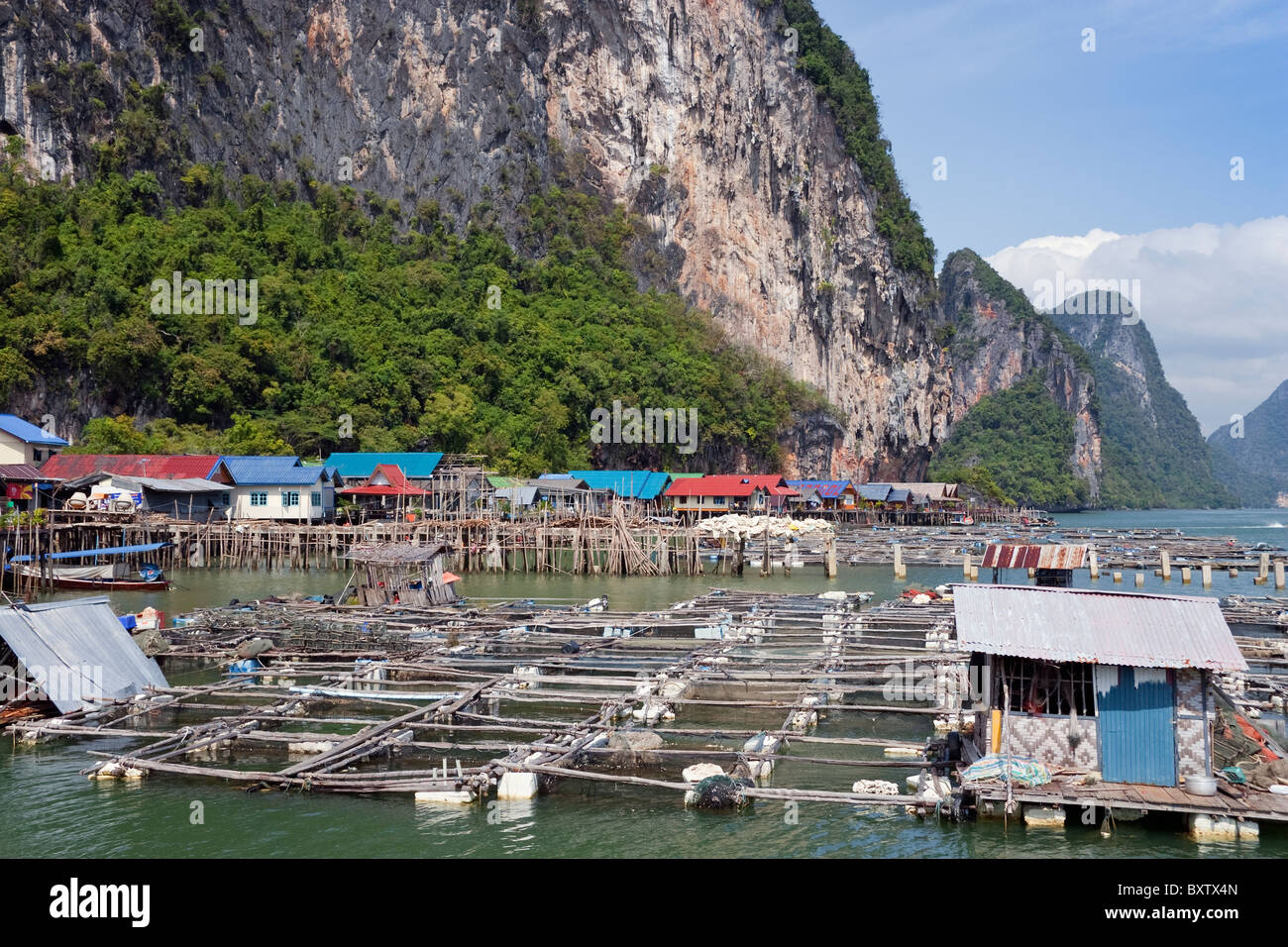 Stilted Muslim Fishing village with Fish Farming Nets, Ko Panyi, Phang ...