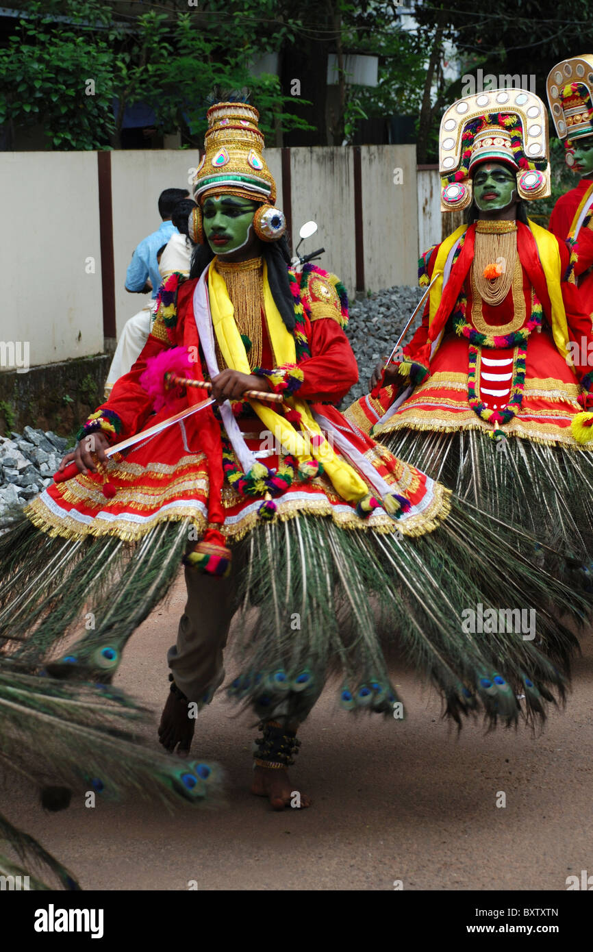 traditional dancers with colourful costumes from a festival in kerala ...