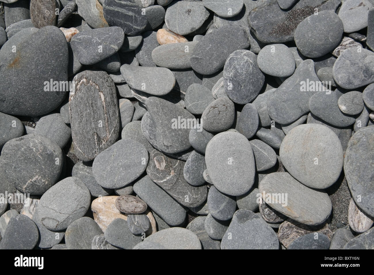 Grey pebbles on Gillespies Beach New Zealand Stock Photo - Alamy