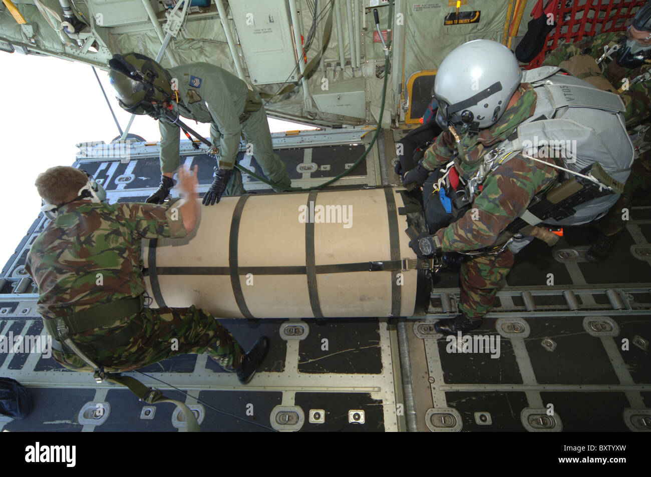 A member from the Pathfinder Platoon gets ready to jump from a C-130 ...