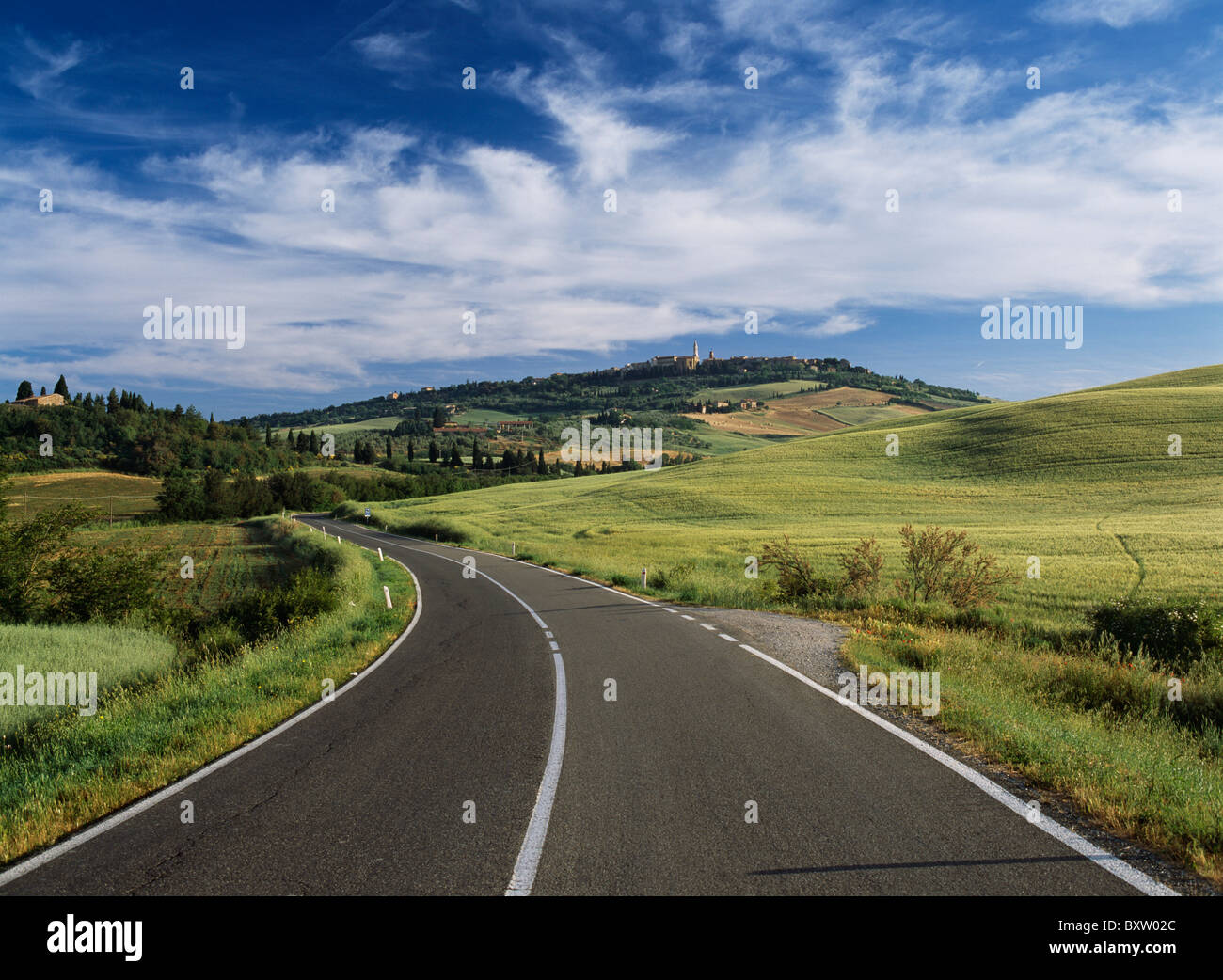 Paved Road Winding Through Tuscan Countryside Stock Photo - Alamy