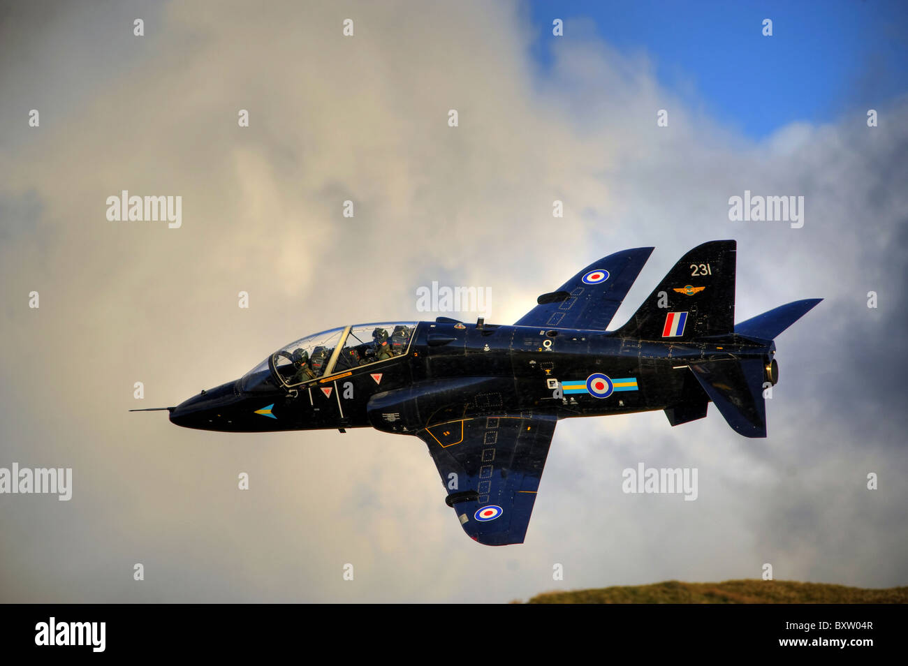 A Hawk T1 trainer aircraft of the Royal Air Force low flying over North ...