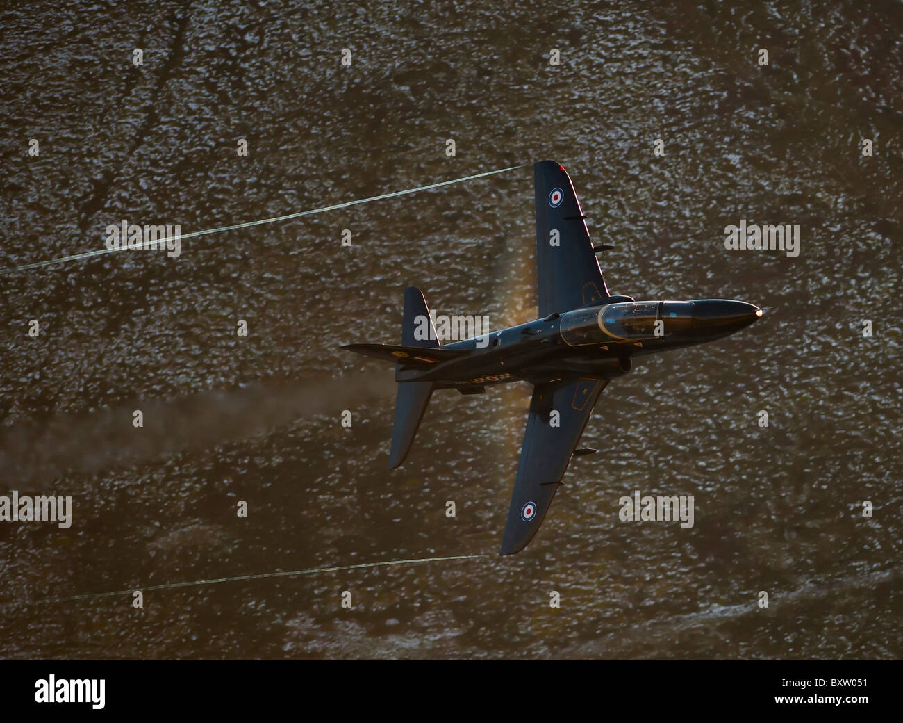A Hawk T1 trainer aircraft of the Royal Air Force low flying over North ...