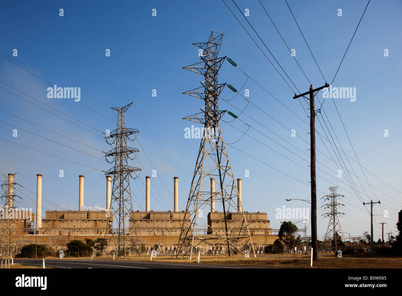 Australia, Victoria, High tension wires and power pylons in front of ...