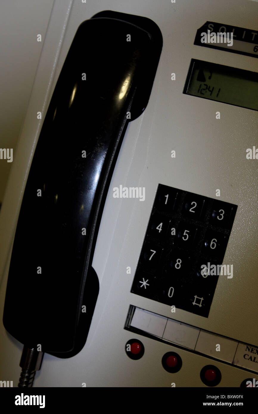 A public payphone working and ready to use situated in an NHS hospital ...