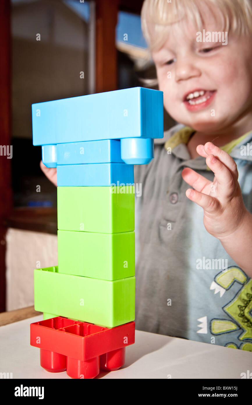 child playing with toys Stock Photo - Alamy