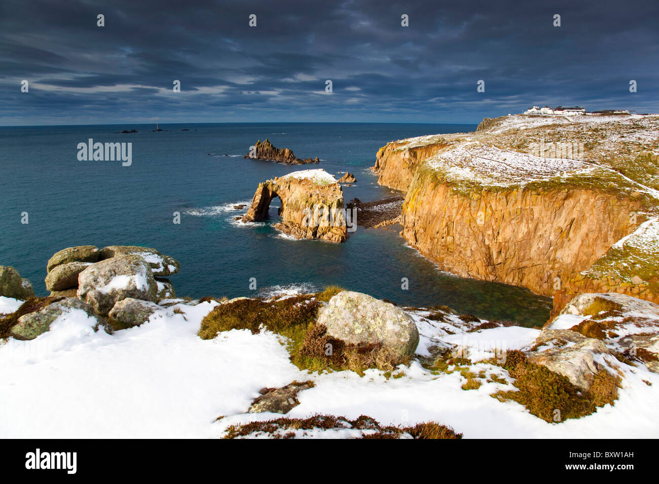 Land's End in the Snow; Cornwall; winter; Longships Lighthouse in the ...