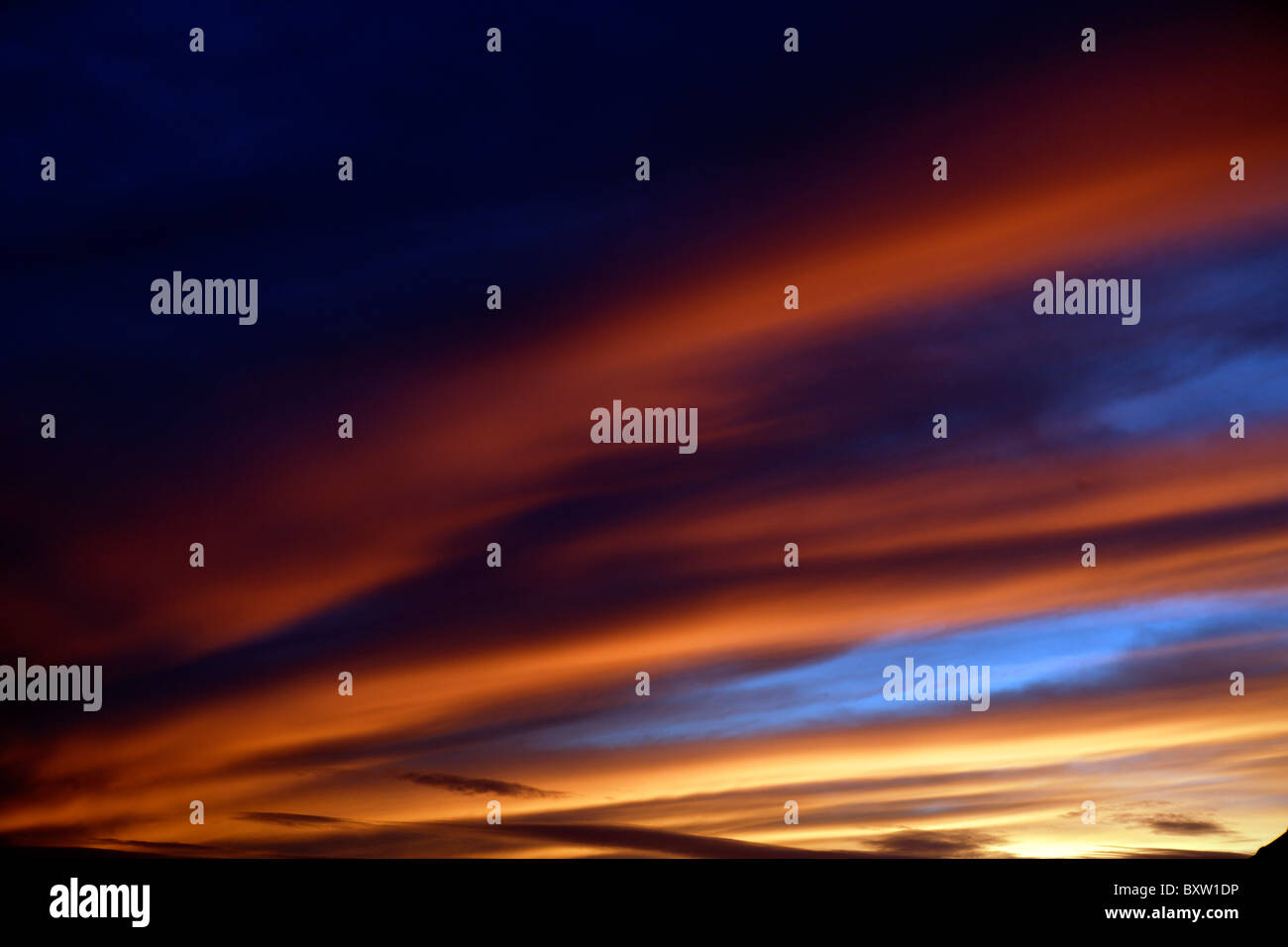 Winter sunset in an early evening sky Stock Photo - Alamy