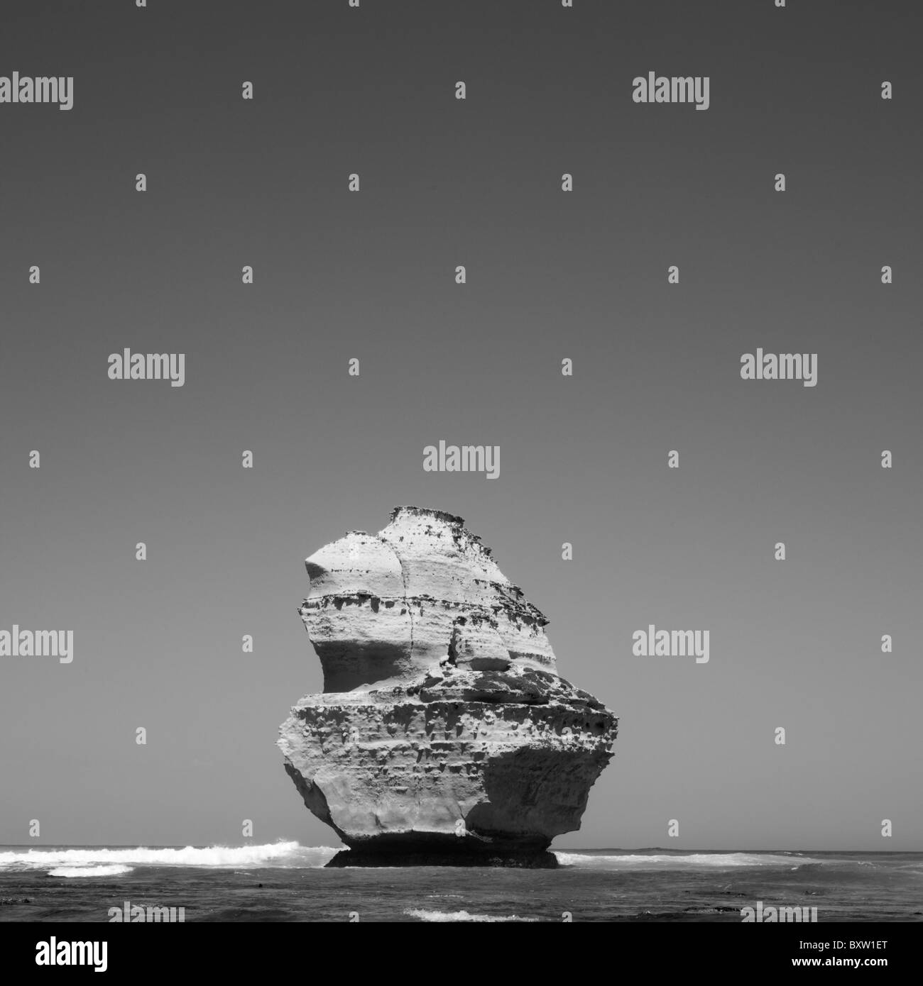 Australia, Victoria, Port Campbell, Eroded rock pillars along beach at ...
