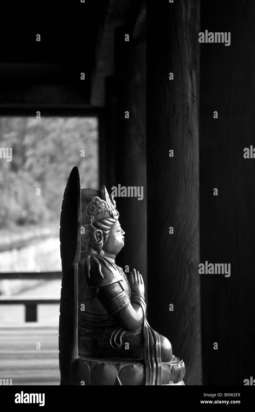 Praying statue, Kiyomizu, Japan Stock Photo - Alamy