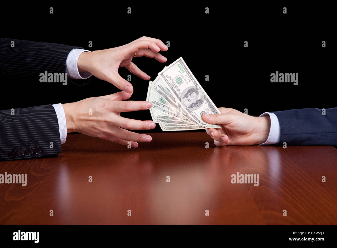 businessman giving money Stock Photo - Alamy