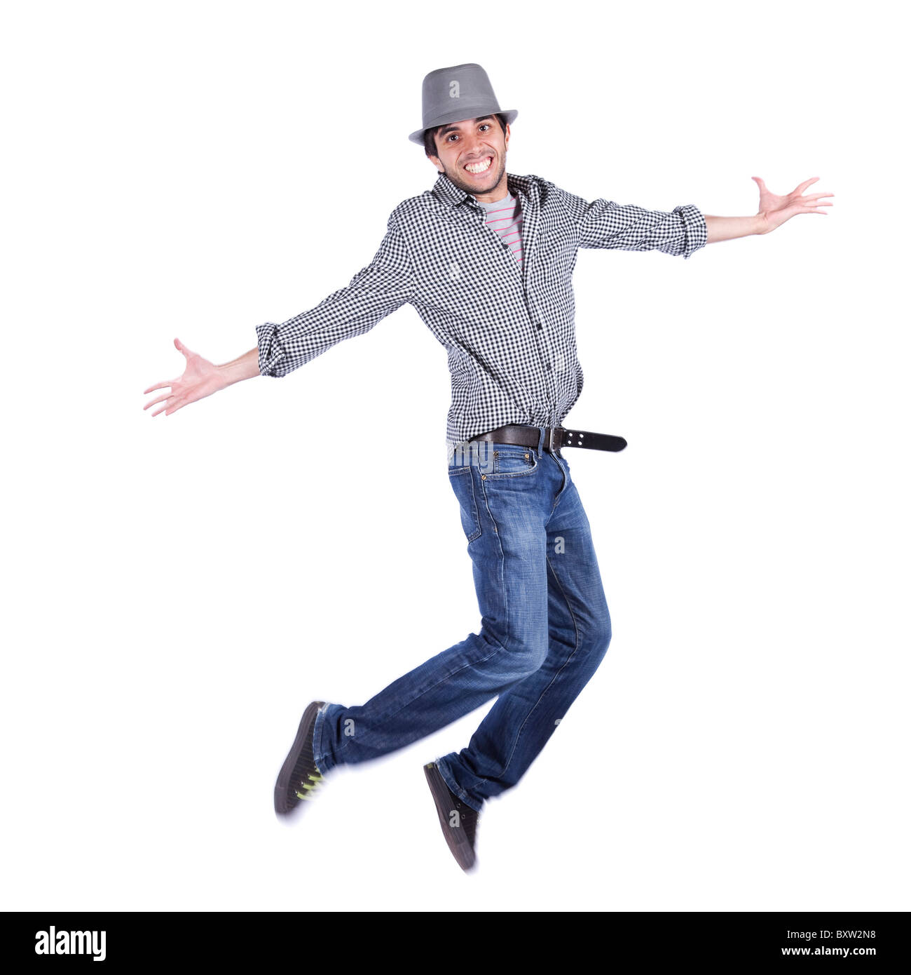 Young man jumping isolated on white (some motion blur Stock Photo - Alamy