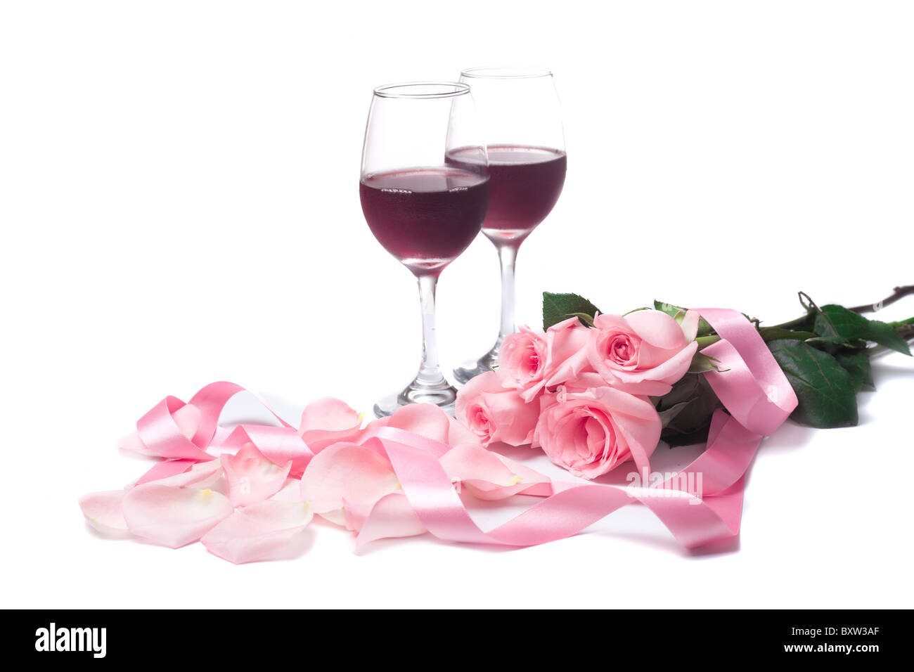 Pink roses and wine isolated Stock Photo - Alamy