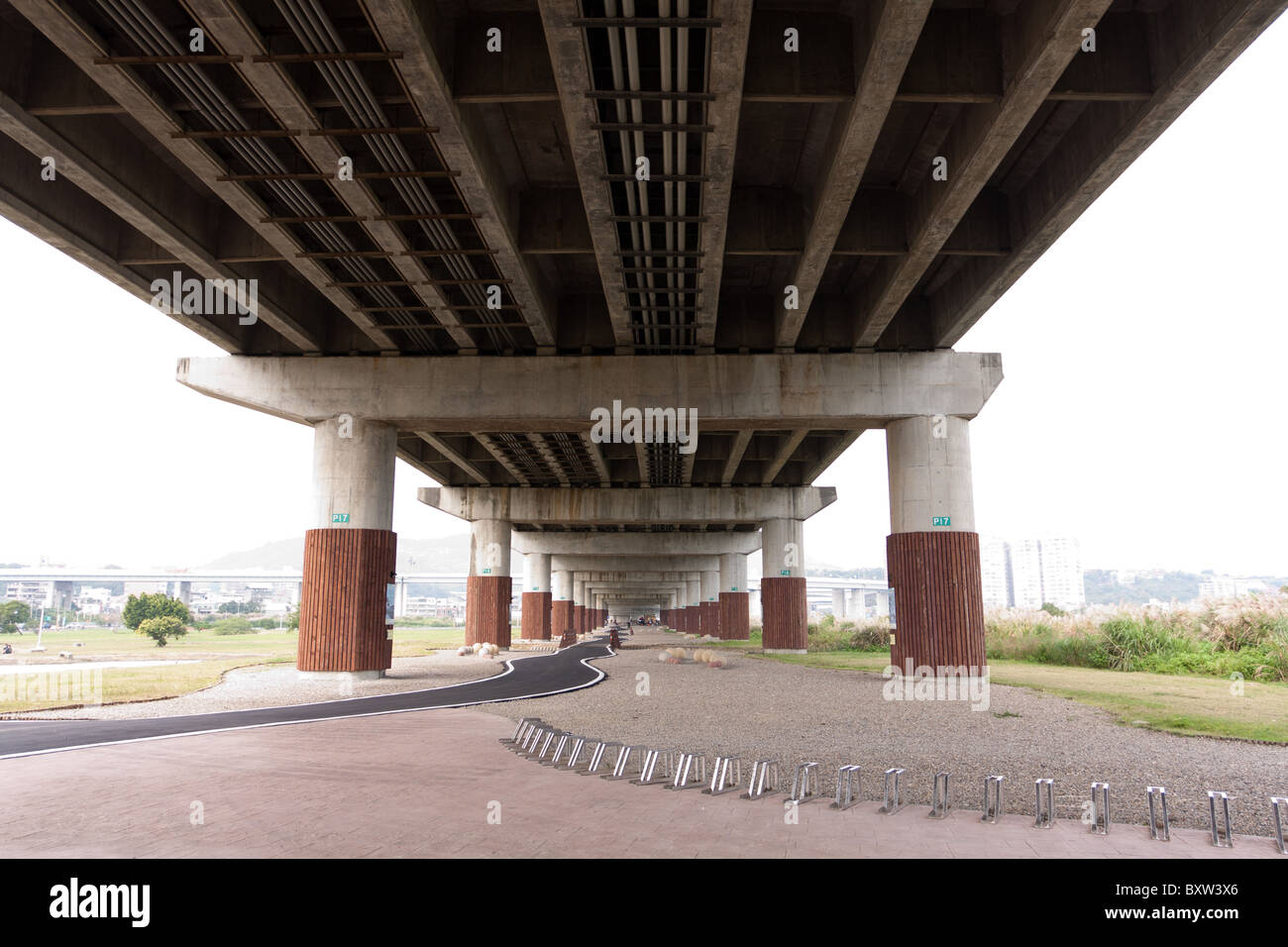 Cycling infrastructure, bike path (L) and bike parking rack, outdoor ...
