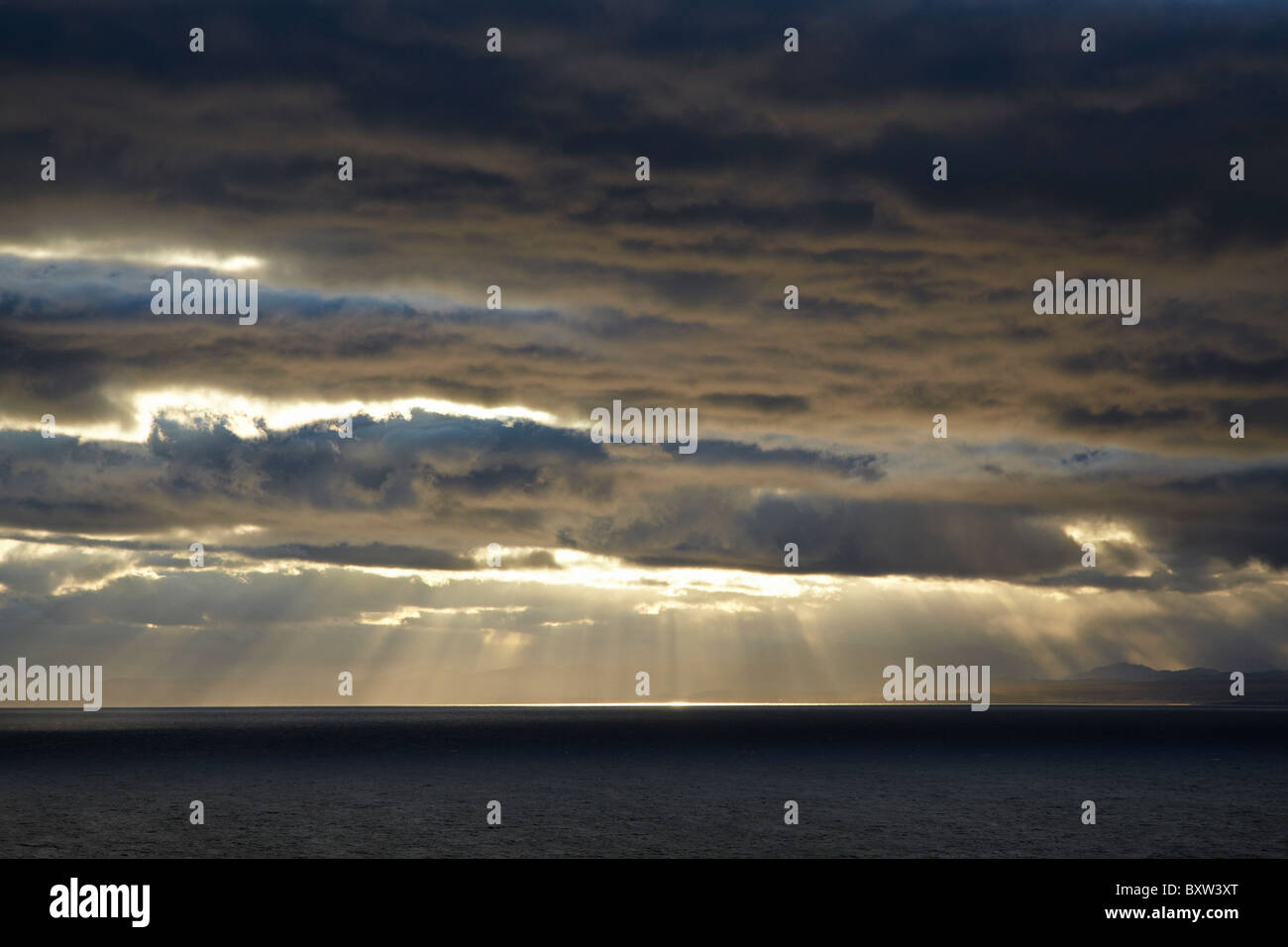 Crepuscular rays sun through clouds hi-res stock photography and images ...