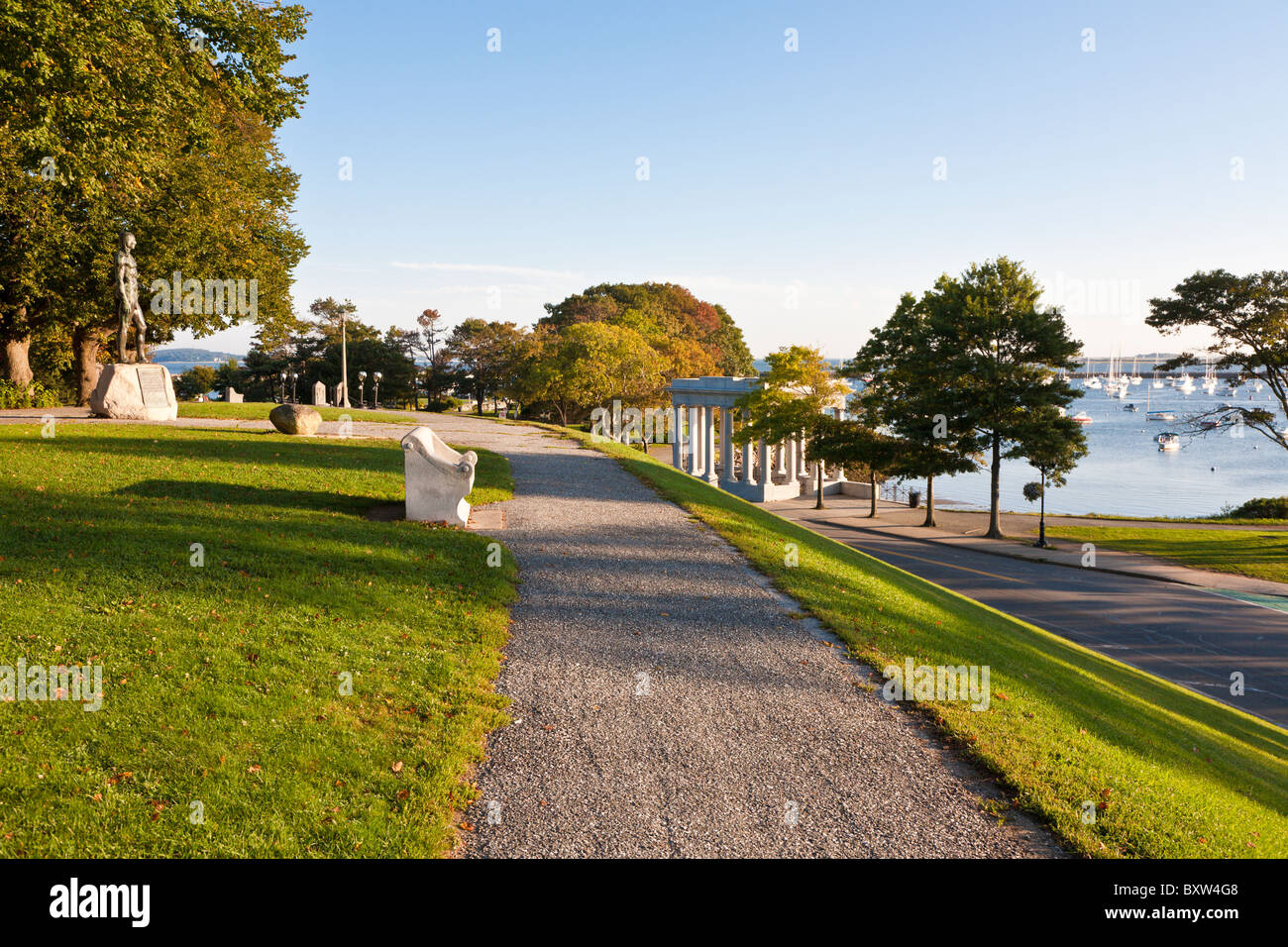 Statue of Massasoit overlooks Plymouth Harbor and Plymouth Rock in the ...