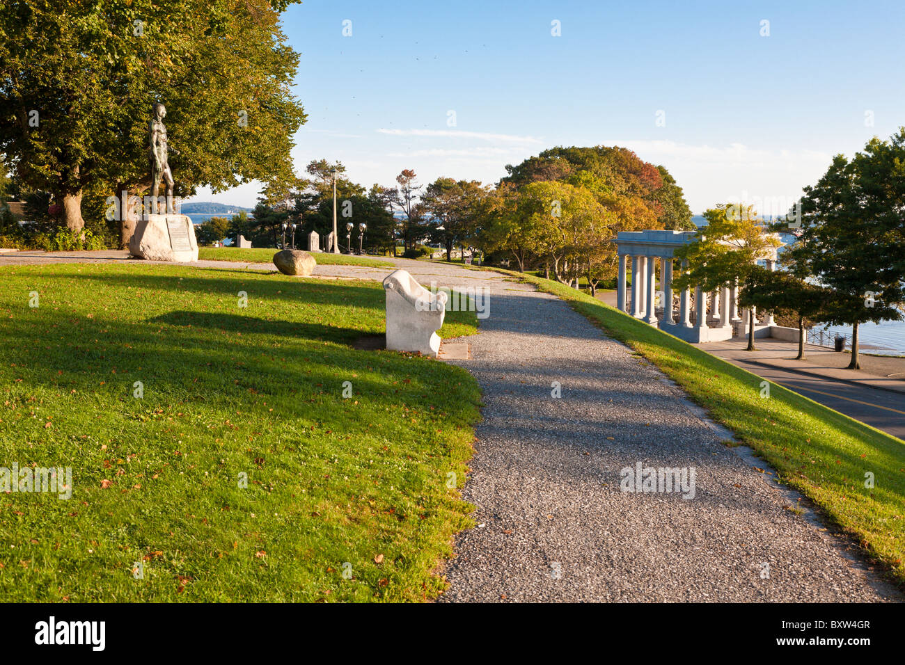 Statue of Massasoit overlooks Plymouth Harbor and Plymouth Rock in the ...
