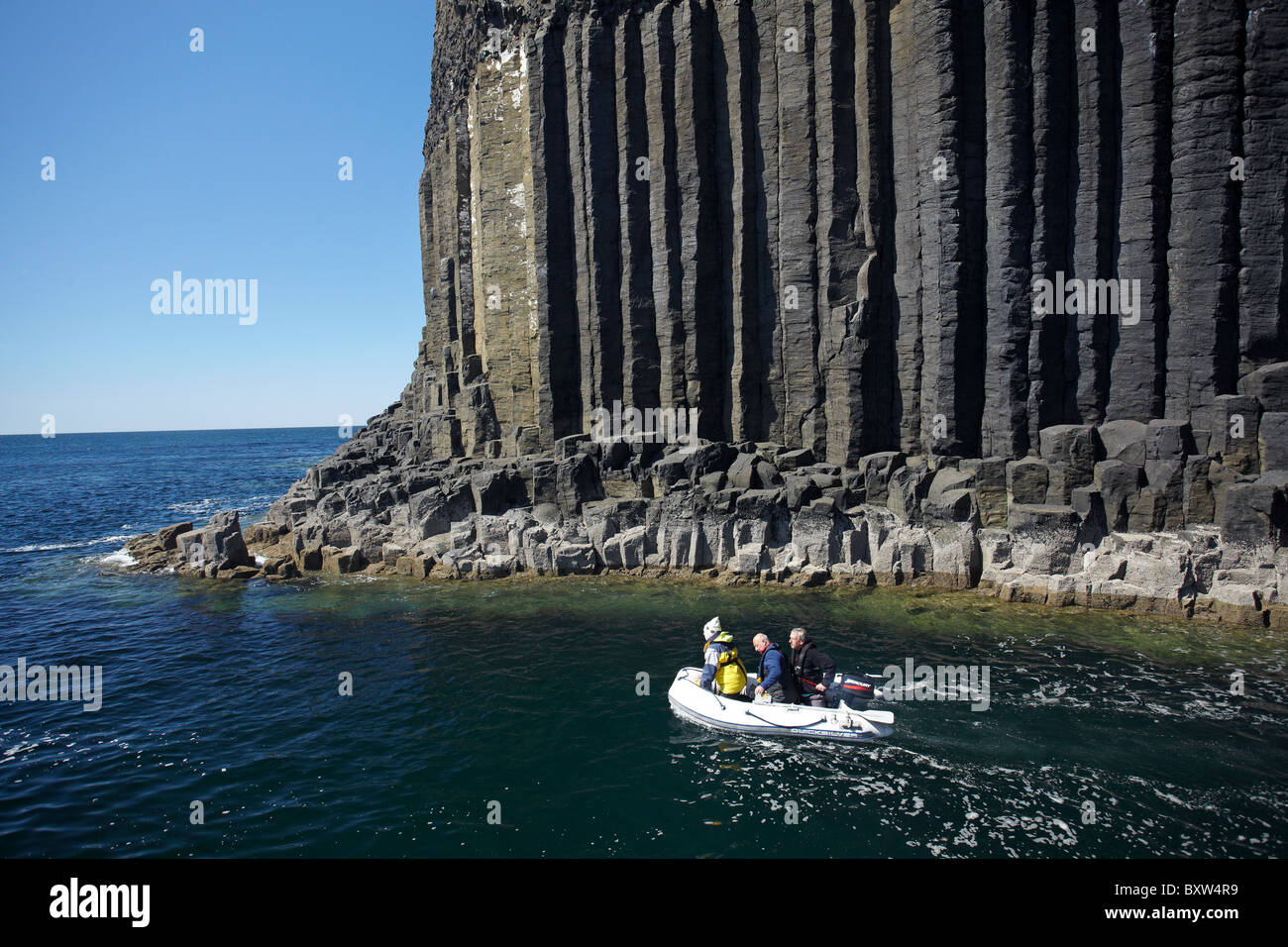 Boat and basalt columns at entrance to Fingal's Cave, Staffa, off Isle ...