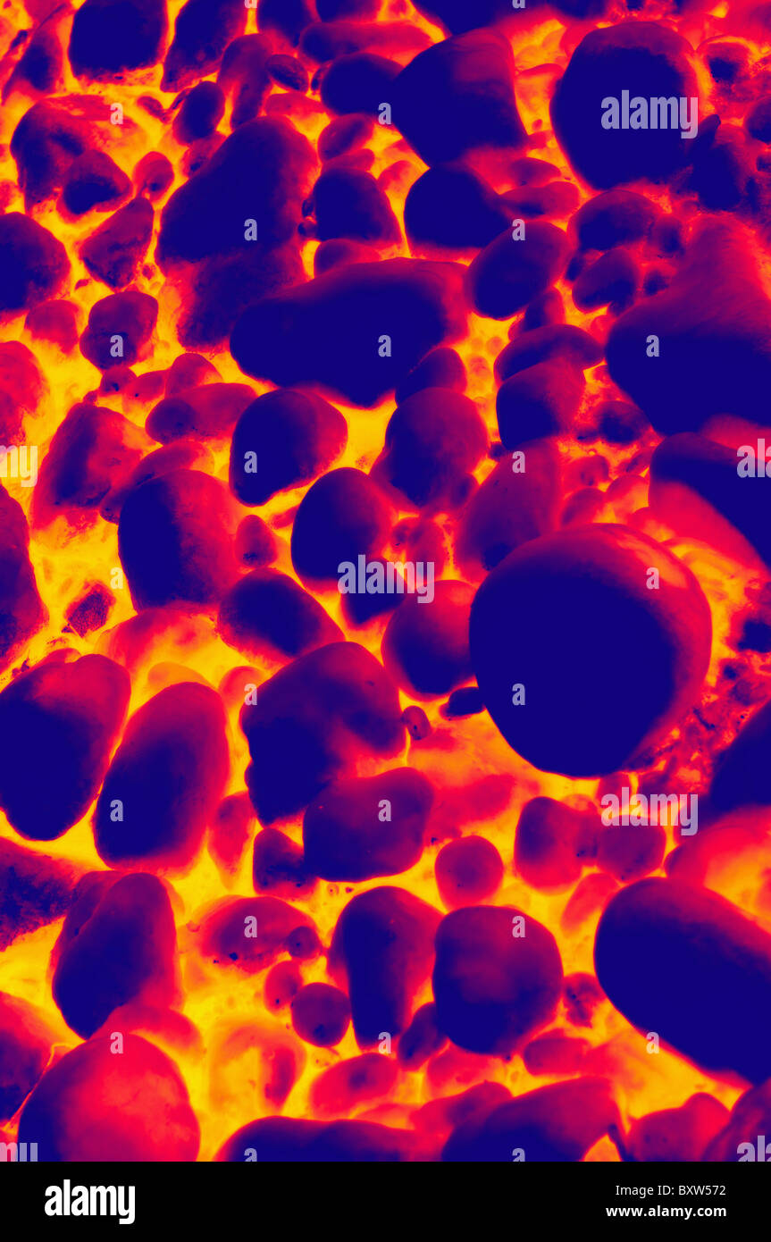Structure from hot stones and coals the yellow red Stock Photo - Alamy