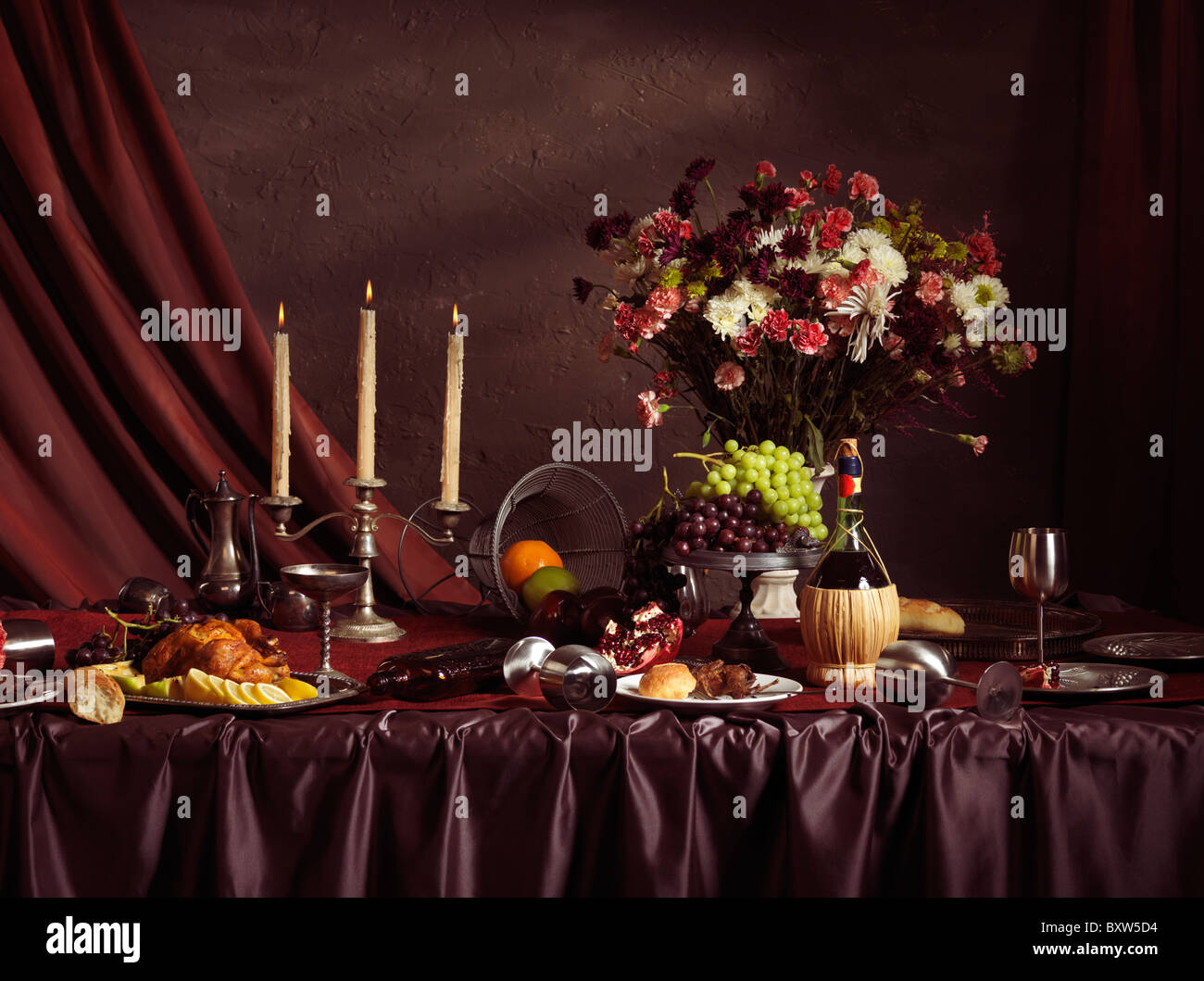 Artistic food still life of remains of a festive dinner on a table ...