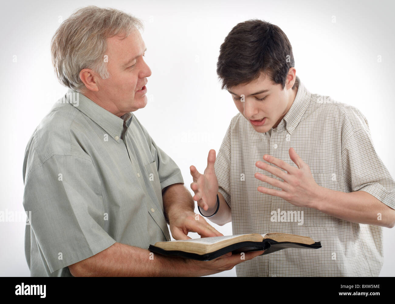 Father (or Preacher) explains God's Word to his son (or to a young man ...