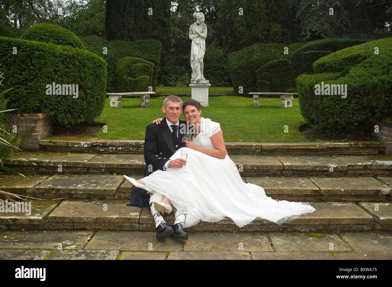 Horizontal portrait of a bride and groom having some quiet time ...