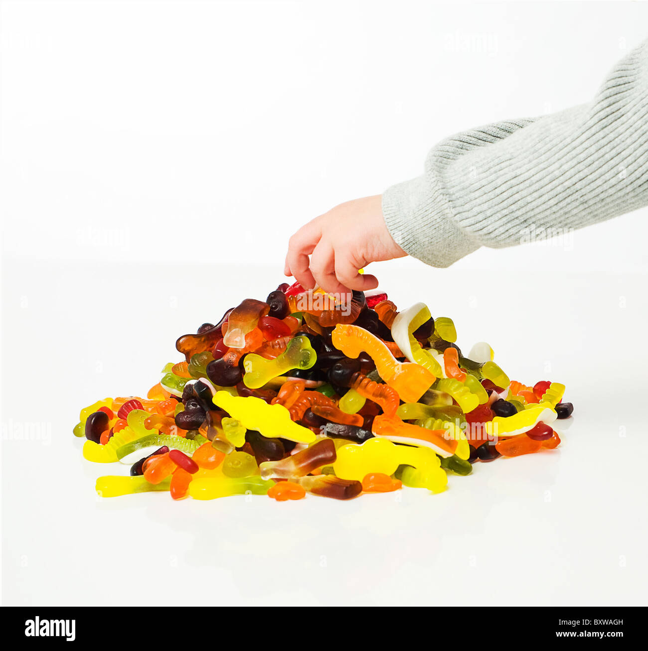 Child candy heap hi-res stock photography and images - Alamy