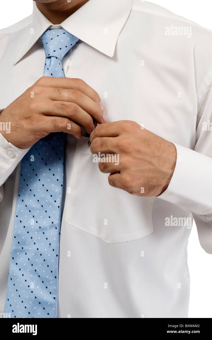 A man placing a pen in his pocket Stock Photo - Alamy