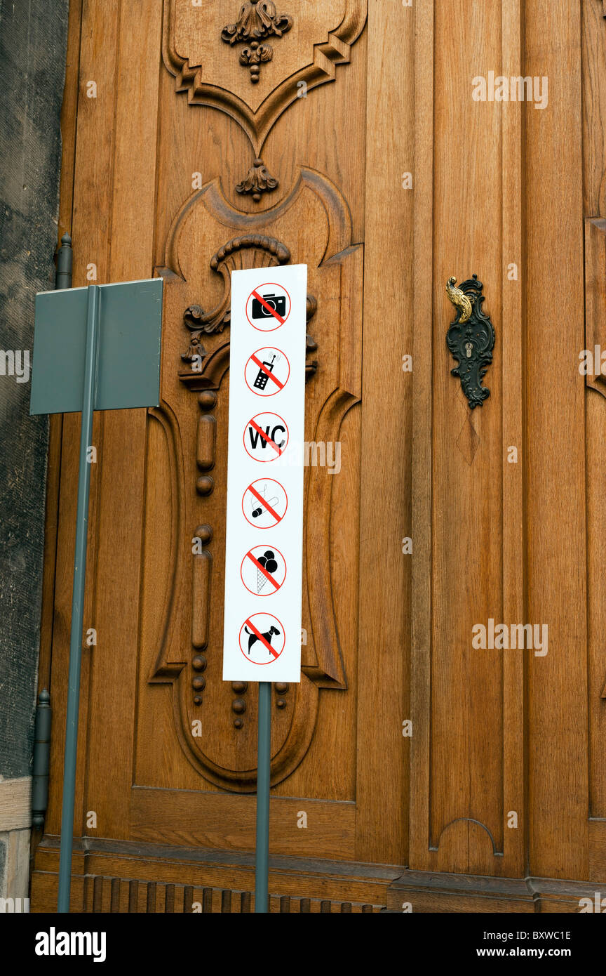FORBIDDEN SIGNS ON CHURCH DOORWAY DRESDEN SAXONY GERMANY EUROPE Stock ...