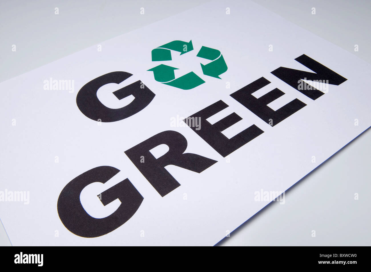 Go Green sign Stock Photo - Alamy