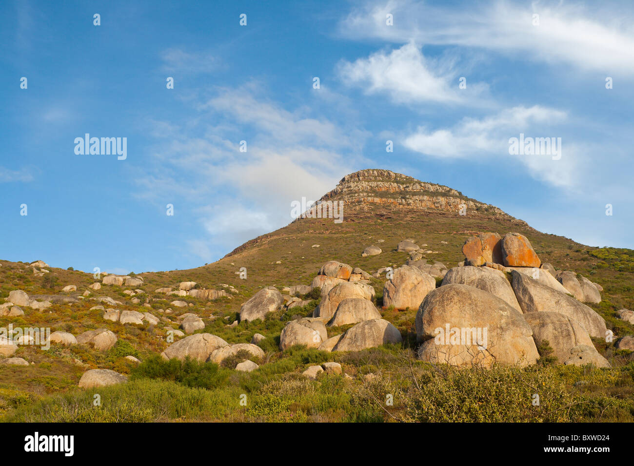 View of a hilltop with many boulders on its slopes Stock Photo - Alamy