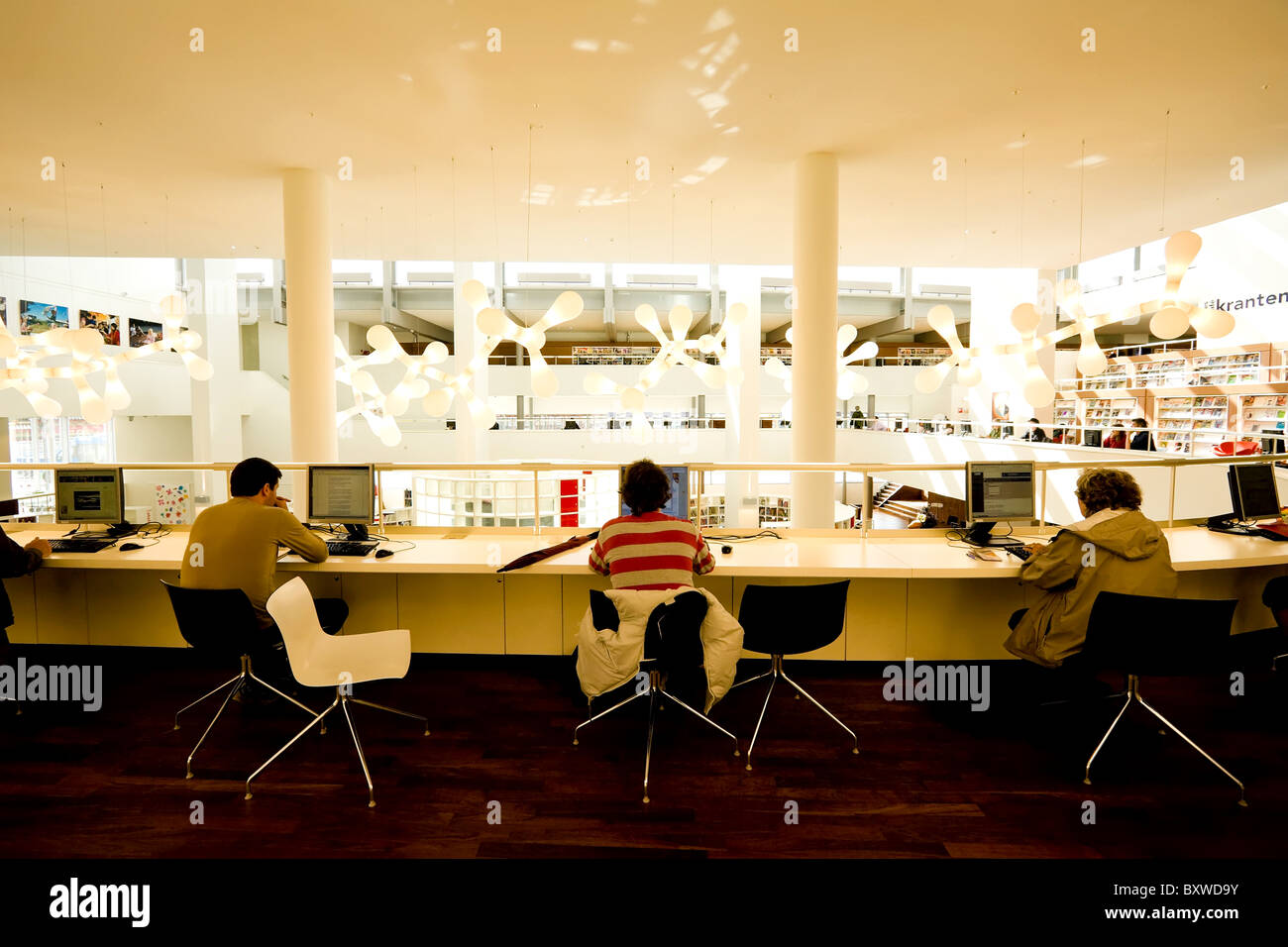 people using computers in an Amsterdam public library Stock Photo - Alamy