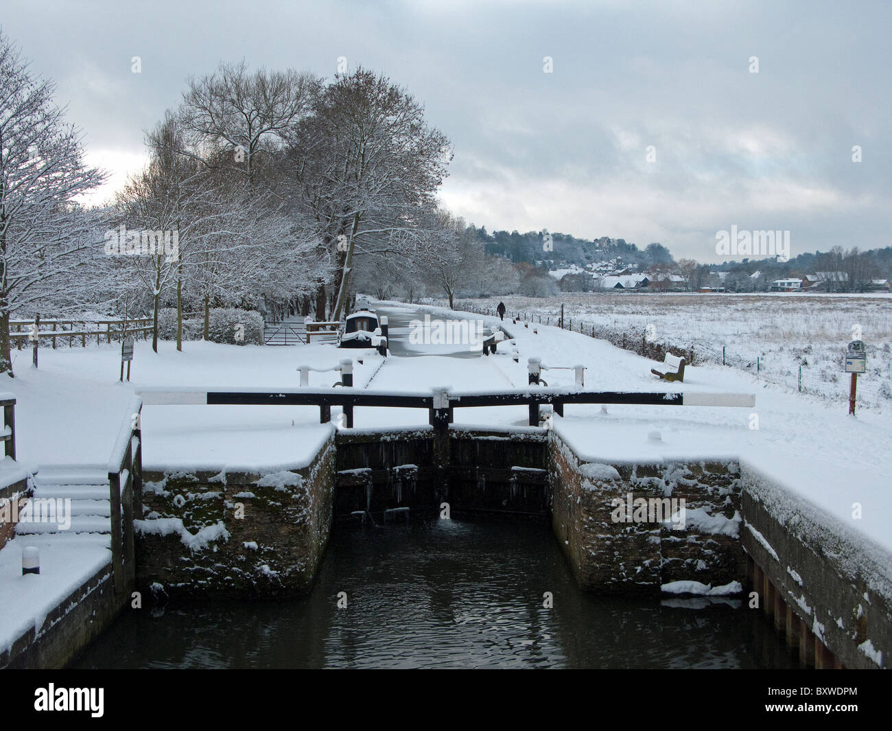 Catteshall Lock in the snow at Farncombe Boathouse on the River Wey in ...