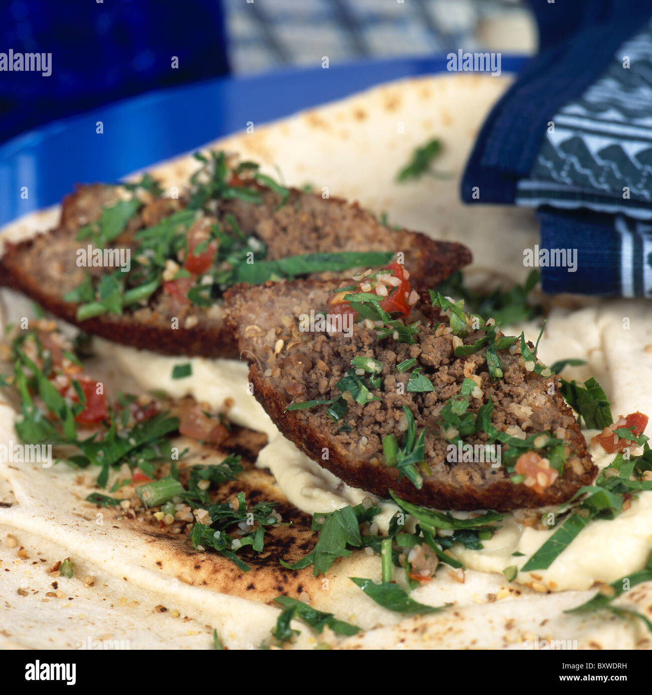 Lebanese Lamb Kibbeh & Hummus Stock Photo - Alamy