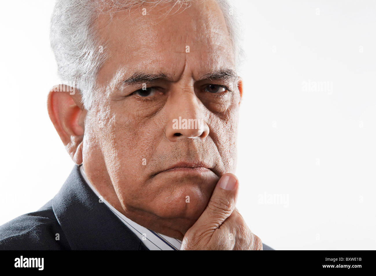 Portrait of a serious man Stock Photo - Alamy