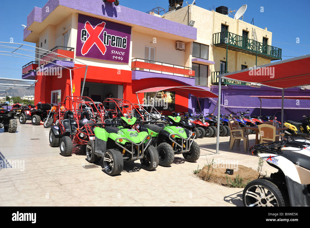 Quad bikes and motorbikes for hire in Malia, Crete Stock Photo - Alamy