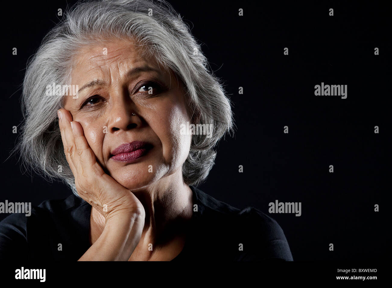 Old woman dreaming Stock Photo - Alamy