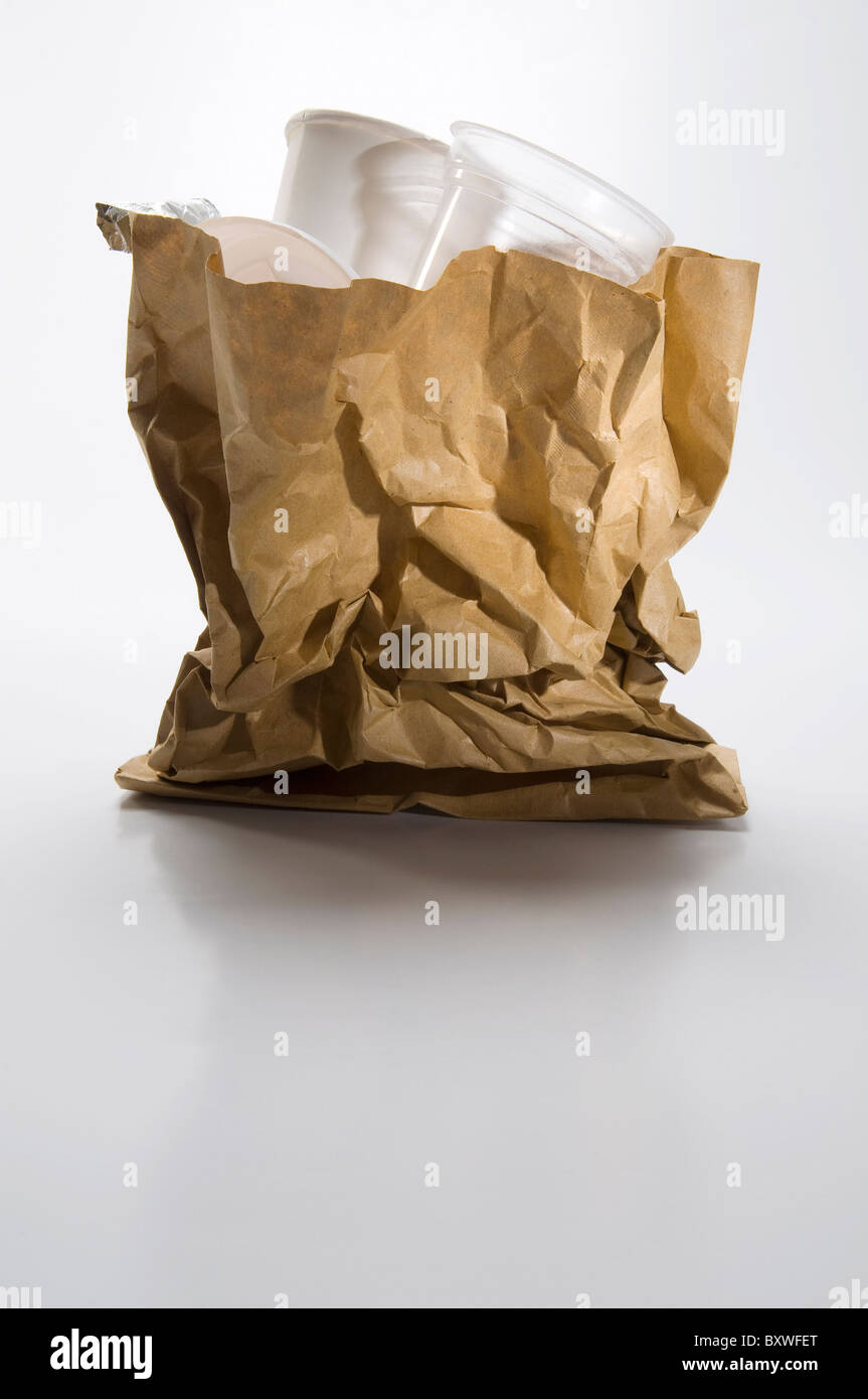Garbage in paper bag Stock Photo - Alamy