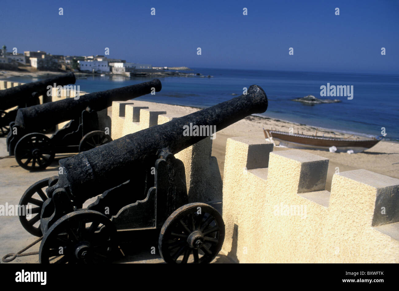 Canons line the battlements of Mirbat Fort, Dhofar, Oman Stock Photo ...