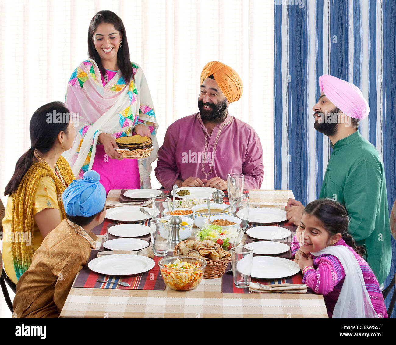 Sikh family having lunch Stock Photo, Royalty Free Image: 33752915 - Alamy